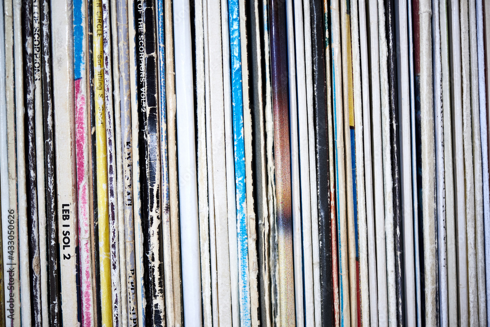 Row of vinyl records background Stock Photo | Adobe Stock