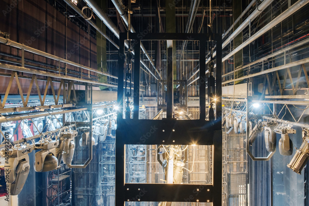 Technical equipment at the backstage of theater. Stage spot lighting ...