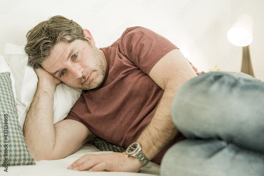 Man suffering depression - dramatic portrait at home of sad and ...