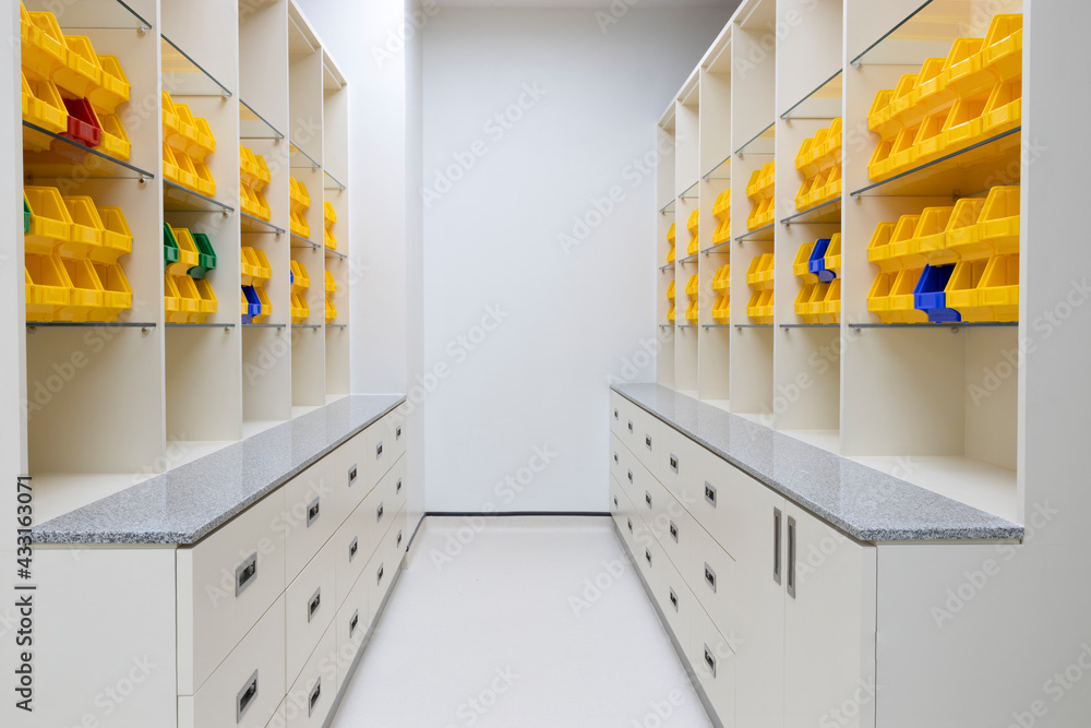 Modern pharmacy shelves with multicolor boxes. Stock-Foto | Adobe Stock