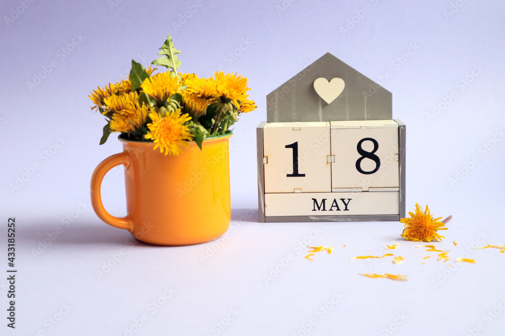 Calendar for May 18: cubes with the number 18, the name of the month of ...