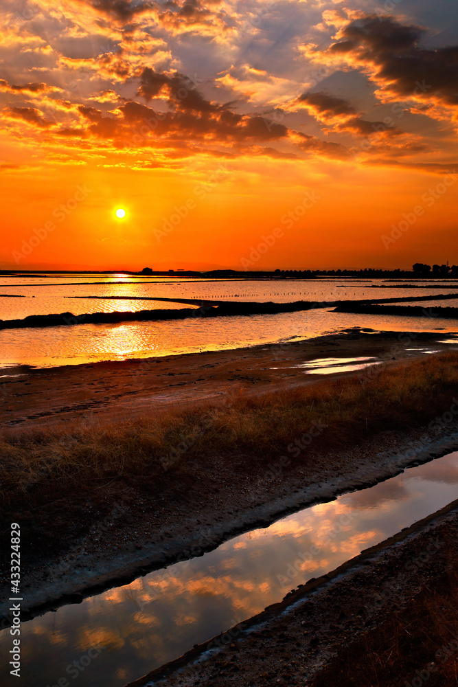 THESSALONIKI PREFECTURE, MACEDONIA, GREECE. Sunset photo at the lagoon ...