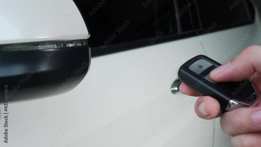 Car key remote control. Locking and unlocking the car by the car key ...