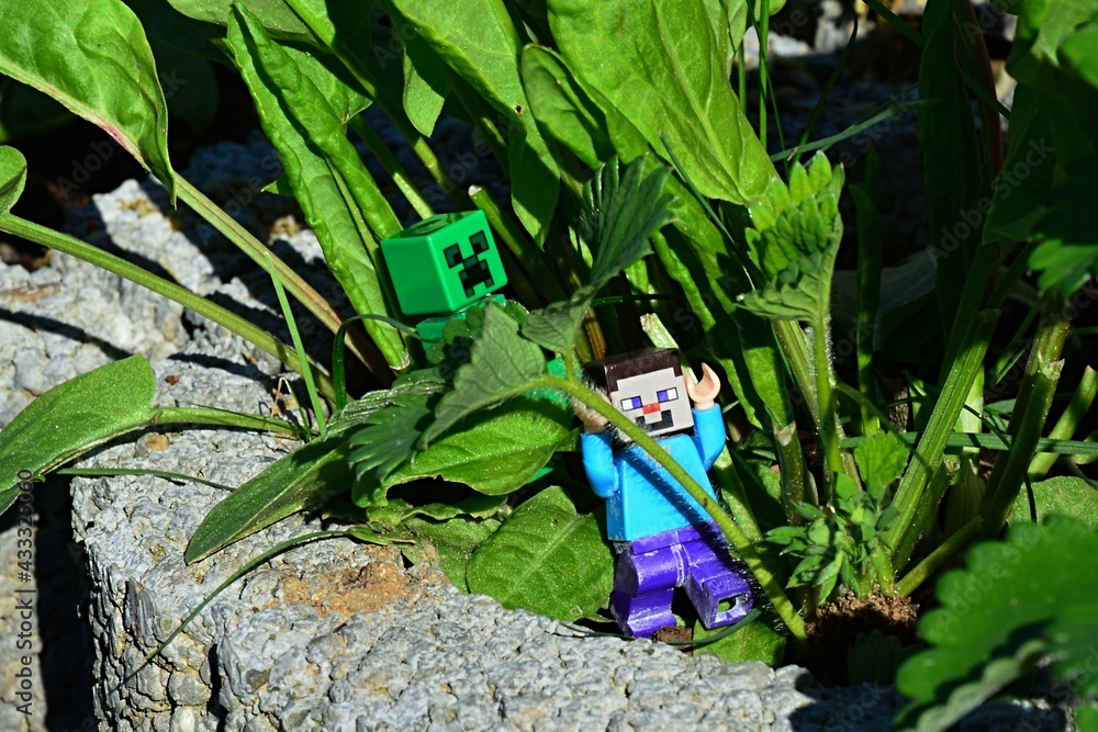 LEGO Minecraft figure of Steve running from Creeper monster explosive ...