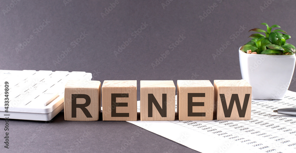 Concept word RENEW on the wooden blocks on the gray background from ...