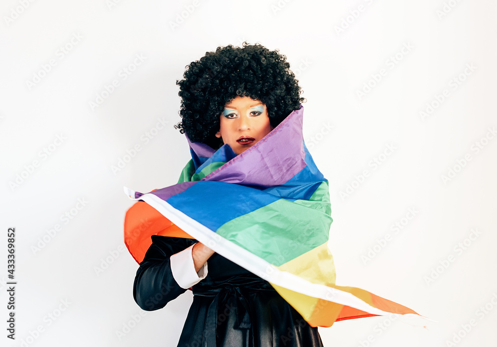 cross-dressing portrait of a proud nun wrapped in lgbtq flag rights on ...