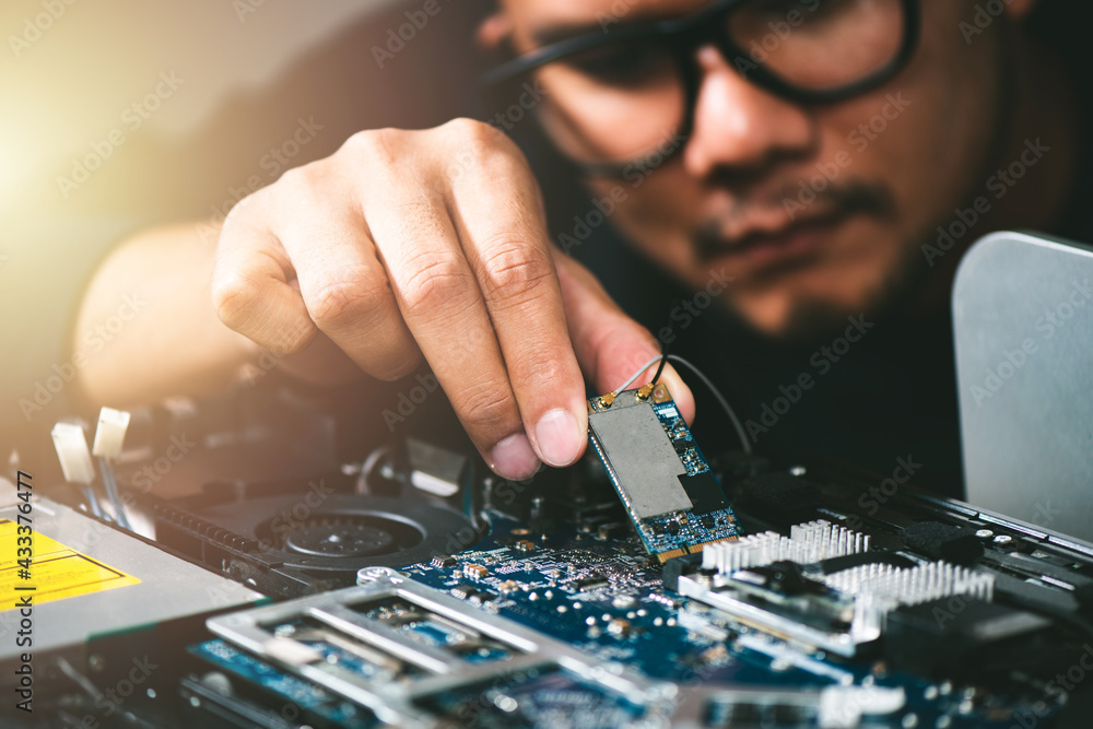 repairing the broken computer Stock Photo | Adobe Stock