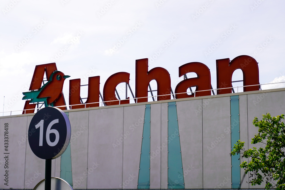 Auchan hypermarket logo sign and brand text on store French grocery ...