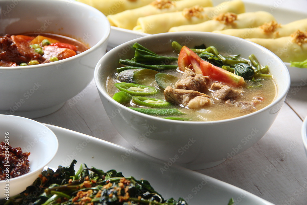 Filipino food called Pork Sinigang or pork and vegetables in tamarind ...