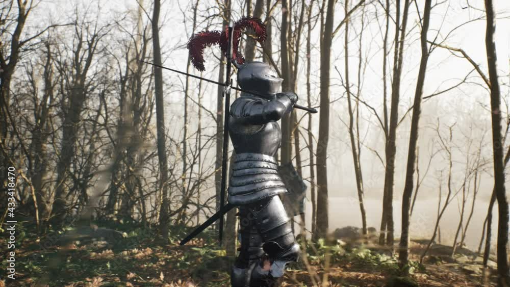 A brave medieval knight walks through the sunny spring forest to battle ...