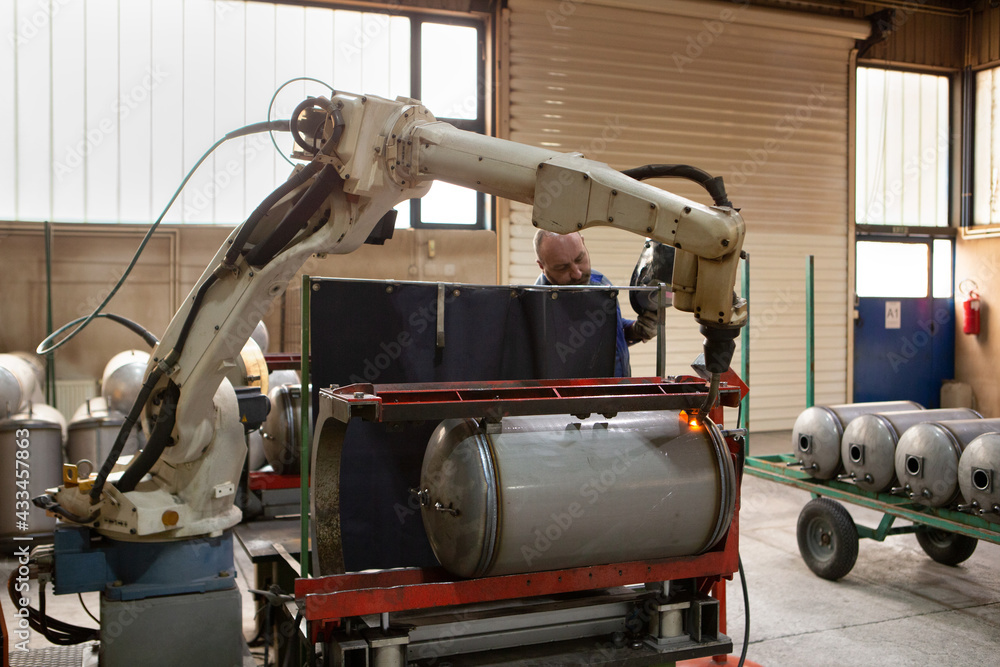 Robotic arm welding inox boiler with argon gas, automated industry ...
