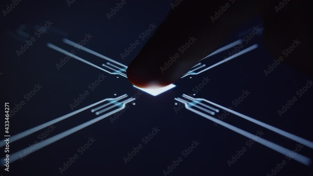 Slow motion human finger turns on touch screen button and activates ...