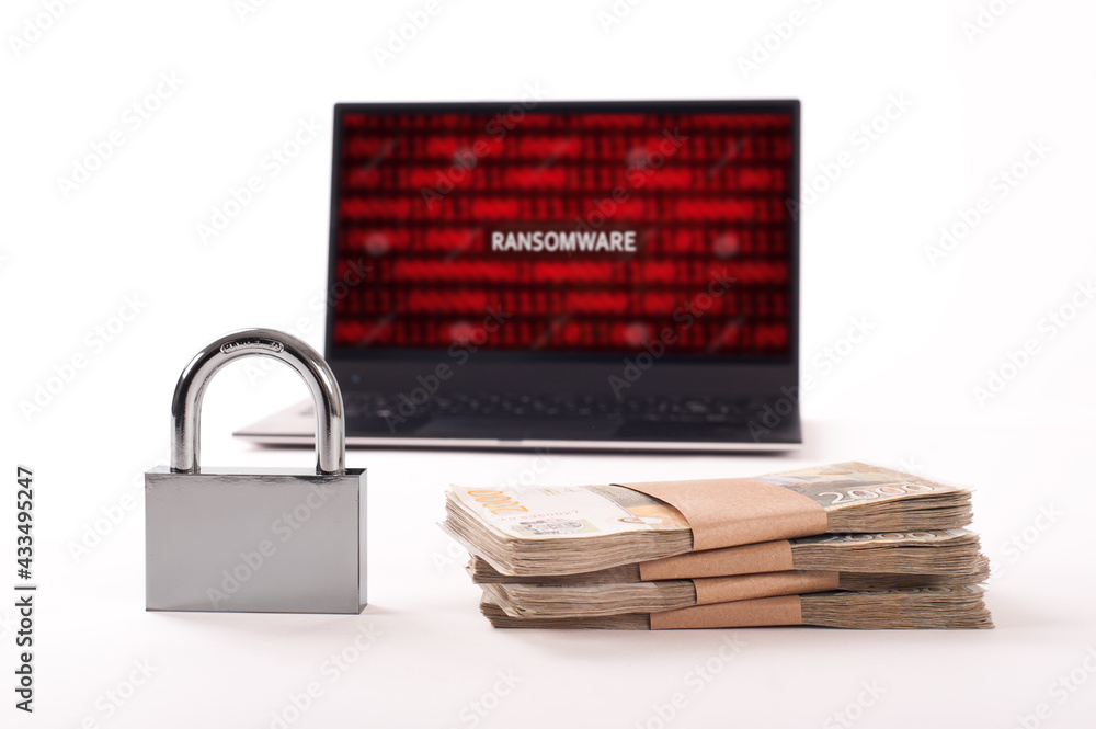 Cyber crime. Internet cyber security concept with a padlock on laptop computer. Ransomware ...