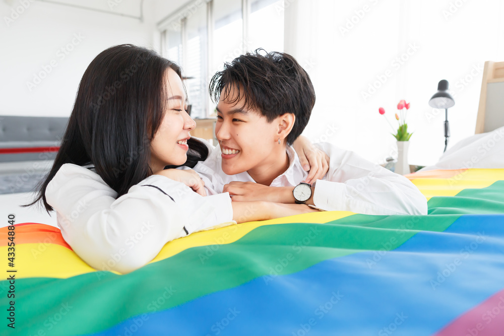 LGBTQ couple lovers, a handsome girl as a man or butch femme girl ...