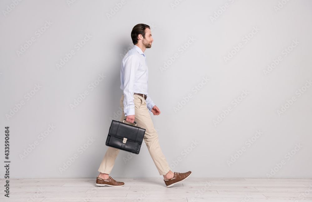 Full length body size profile side view of nice imposing classy man ...