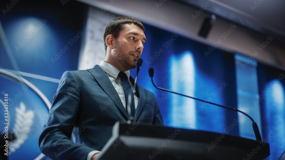Portrait of an Young Organization Representative Speaking at Press ...