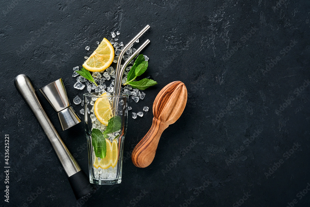 Mojito or Lemonade cocktail in highball glass with ice cubes, mint and ...