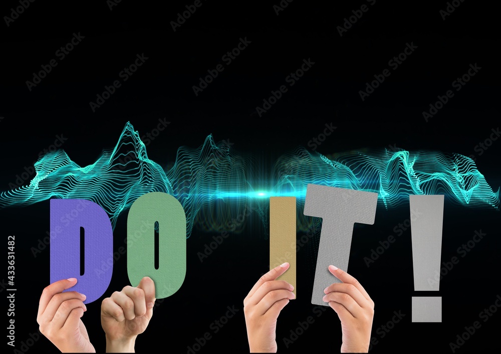 Composition of do it text in multi coloured letters held by people with ...