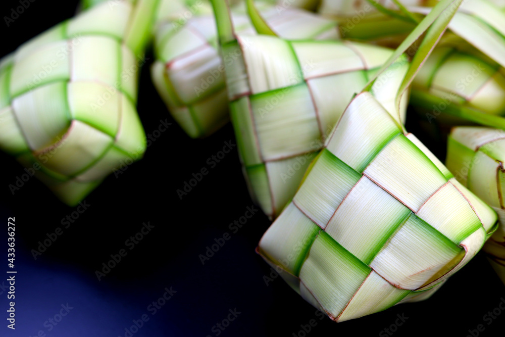 rice cake boiled in a rhombus-shaped packet of plaited young coconut ...