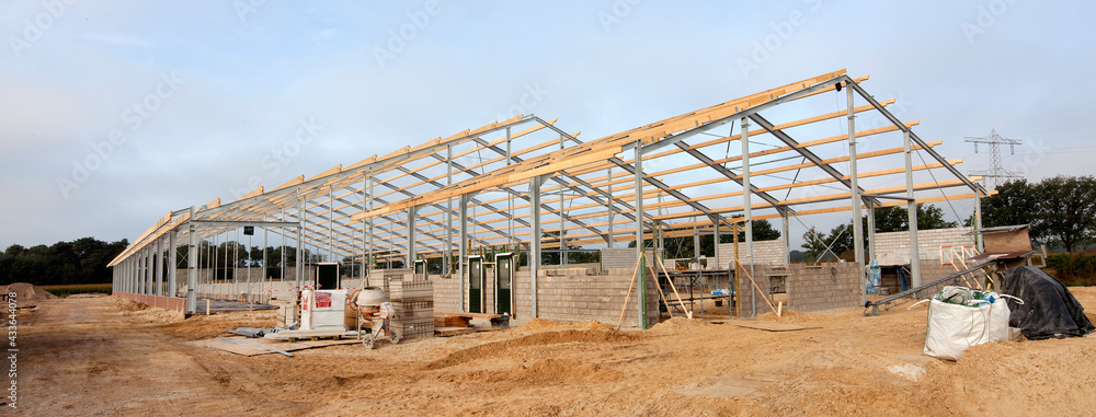Building of a new stable. Building site. Construction. Skeleton ...