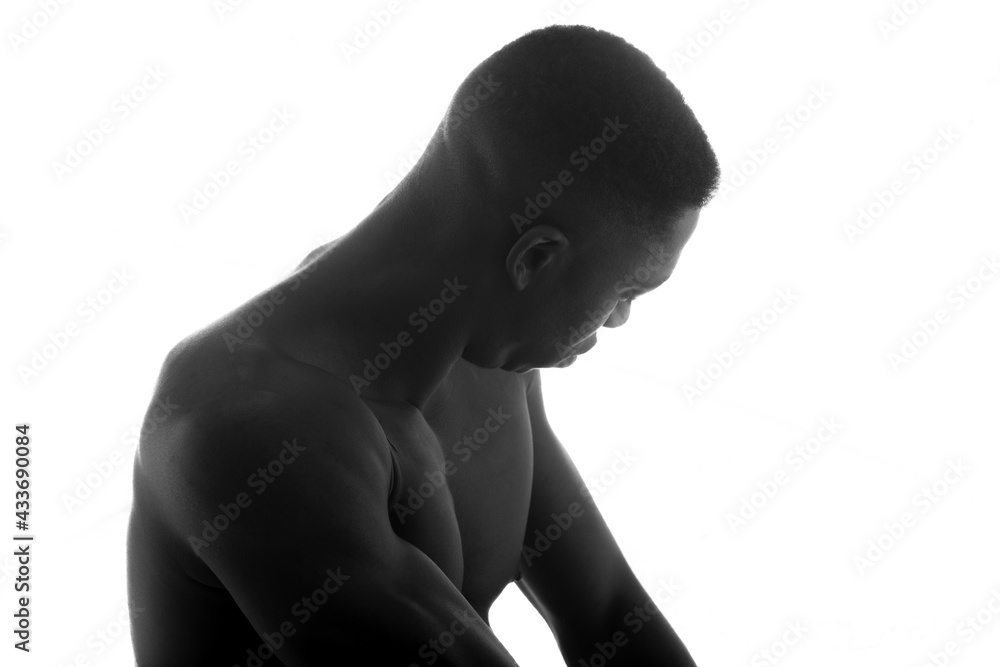 Black and white of unemotional shirtless muscular young black man ...