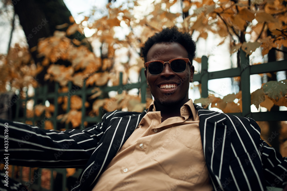 Style and fashion concept. Portrait of attractive charismatic young ...