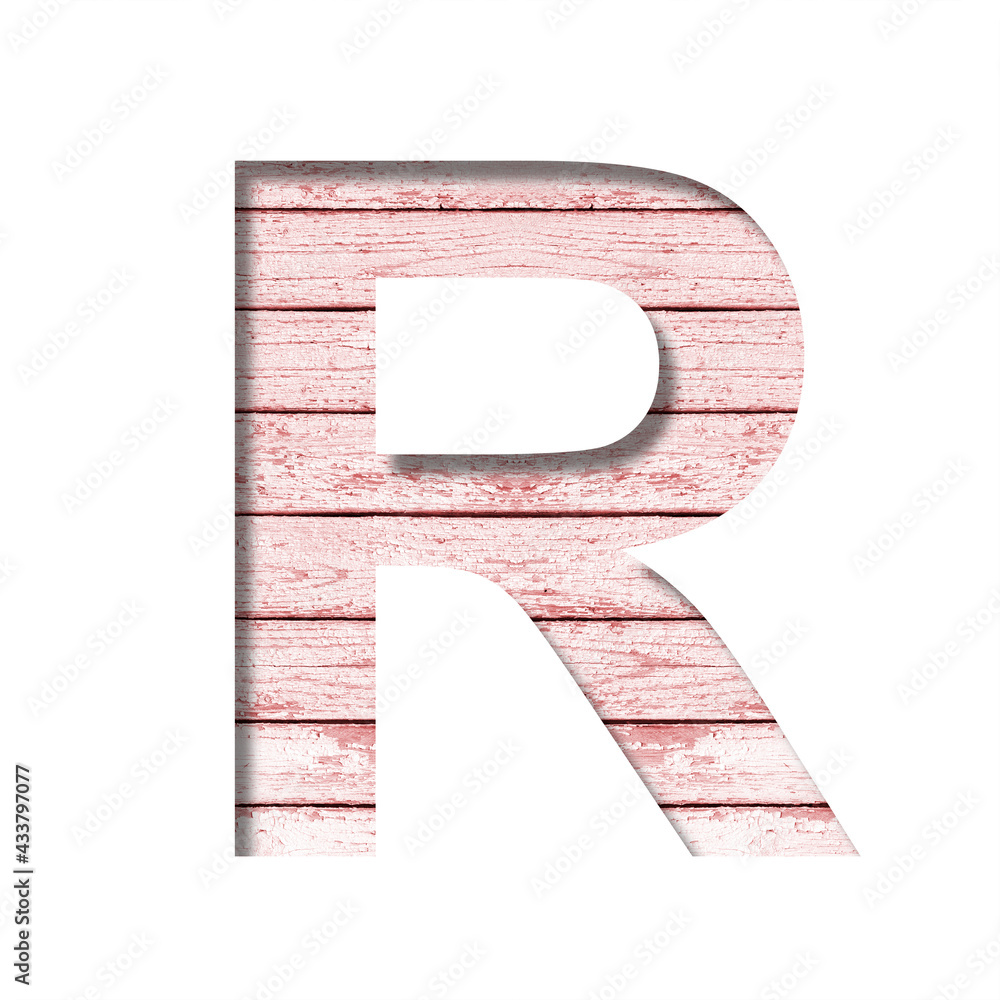 Font on boards with old paint. The letter R cut out of paper on a ...