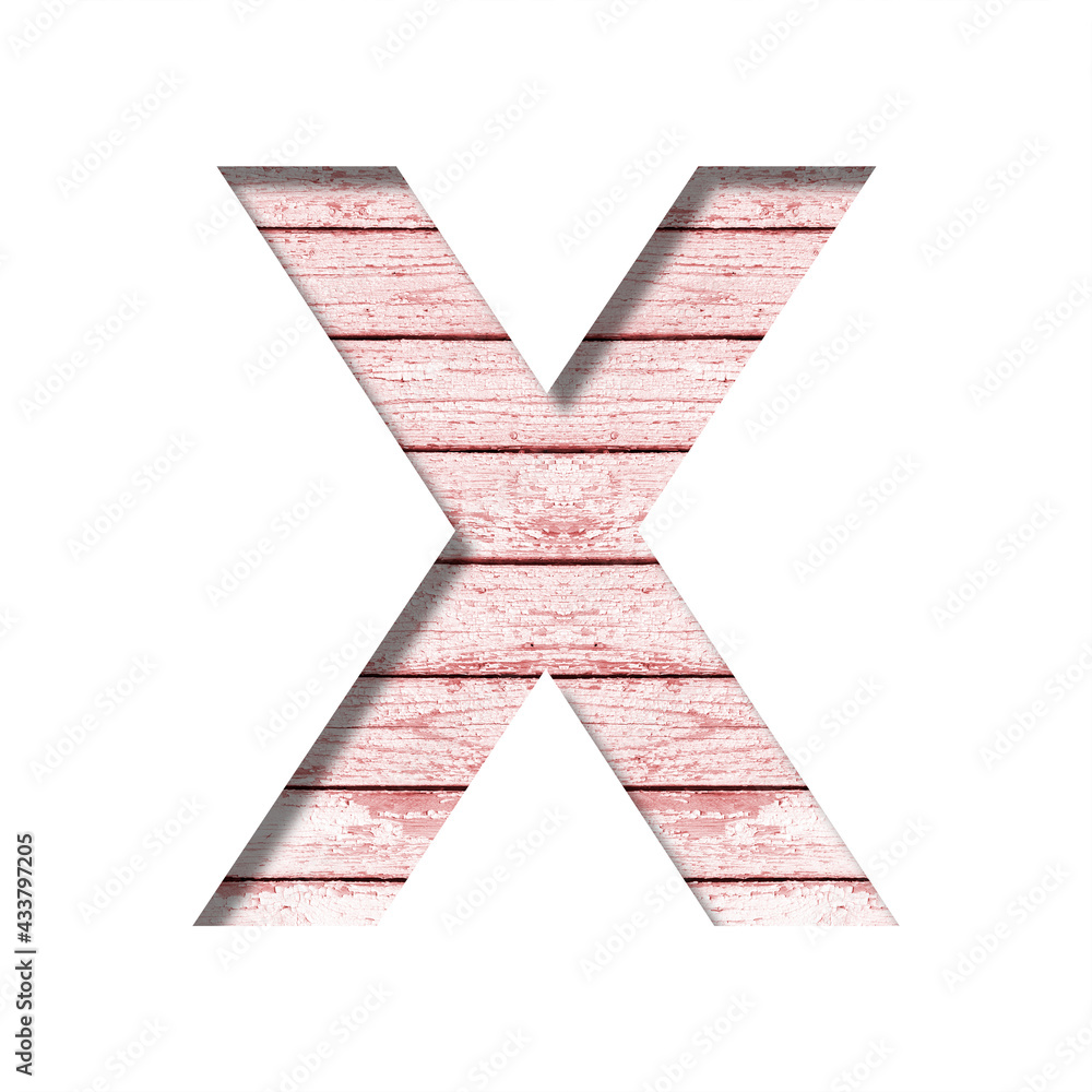 Font on boards with old paint. The letter X cut out of paper on a ...
