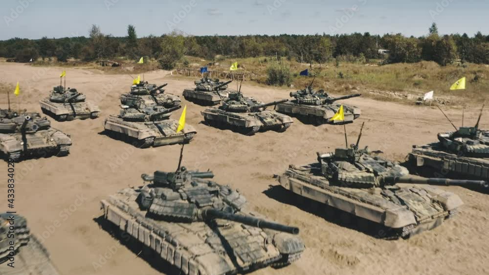 Armored tanks on battlefield aerial. Military training. War machines at ...