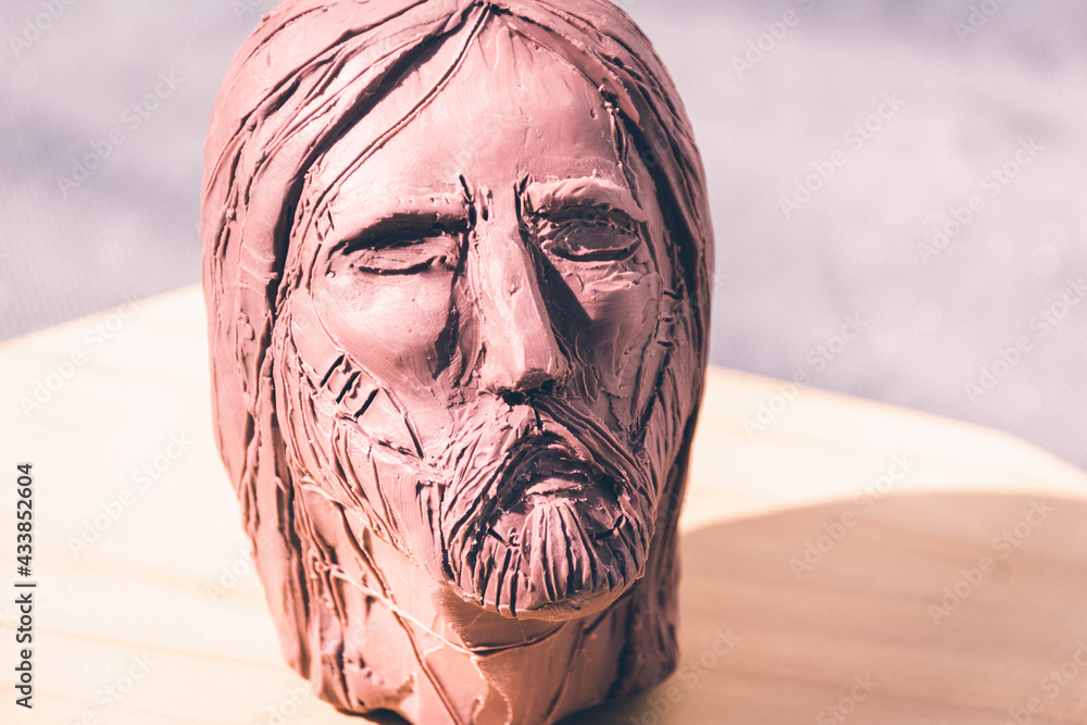 Jesus Christ face clay sculpture Stock Photo | Adobe Stock