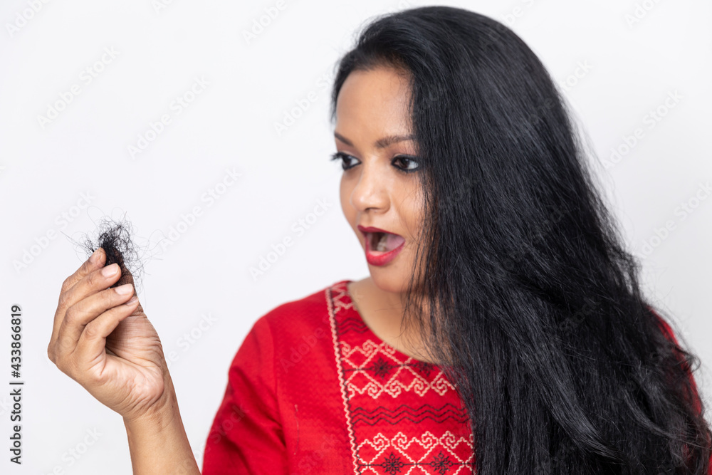 Portrait of Indian woman with long hair facing hair fall problem, hair ...