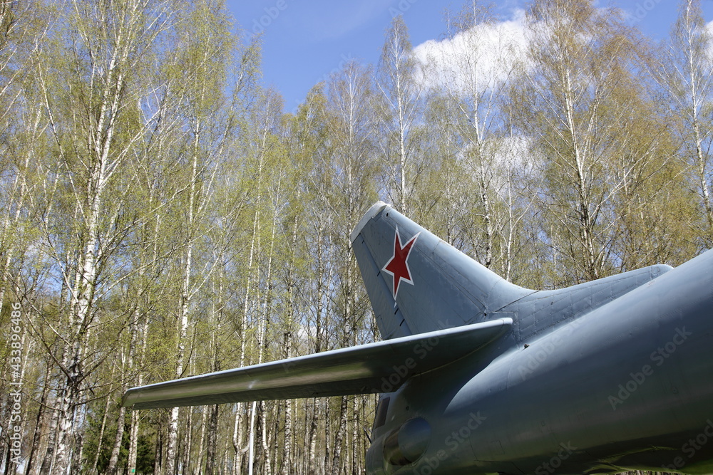 The tail fin and stabilizer of a Soviet turbojet military aircraft ...