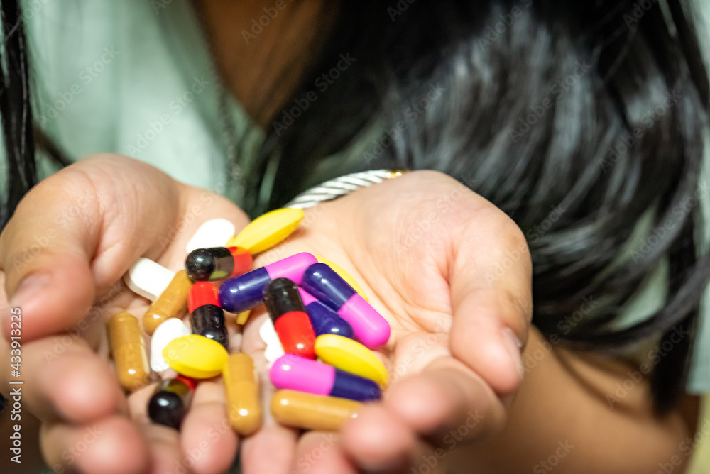 Pharmaceutical medicine pills in both tablets and capsules with the ...