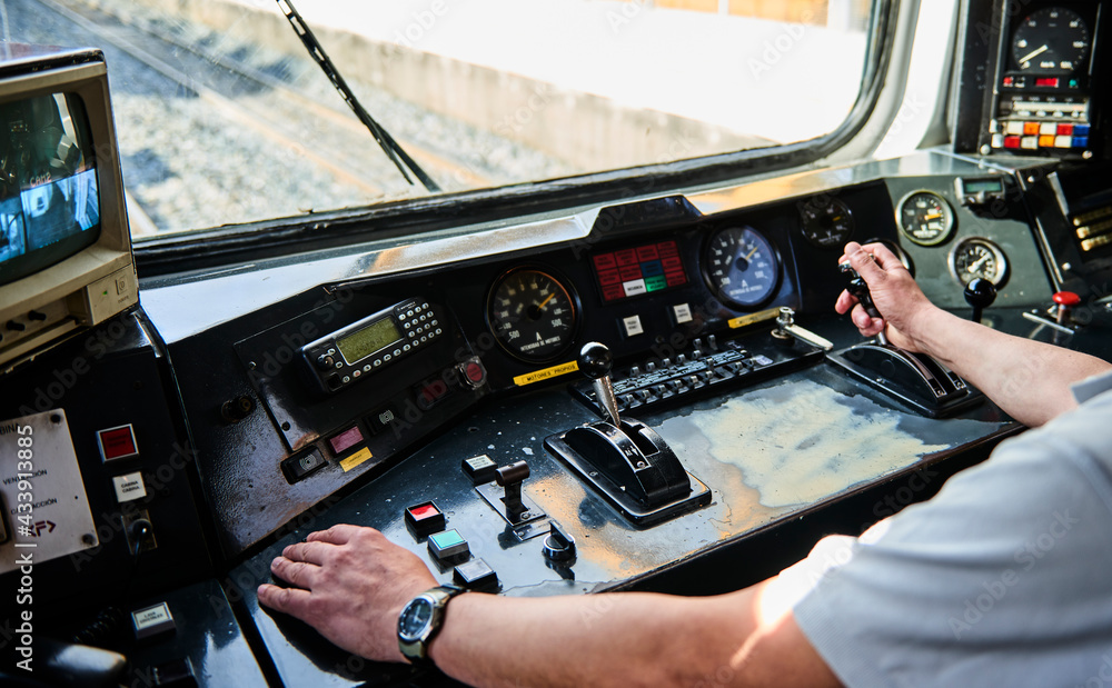 Interior view of the pilot hands and instrument panel cockpit of ...