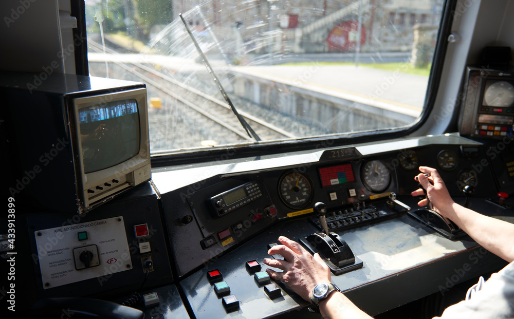 Interior view of the pilot hands and instrument panel cockpit of ...