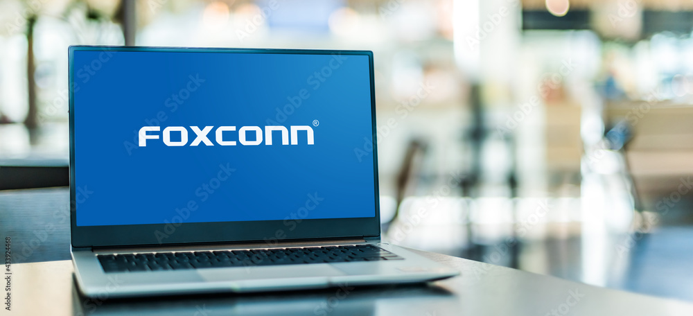 Laptop computer displaying logo of Foxconn Stock Photo | Adobe Stock