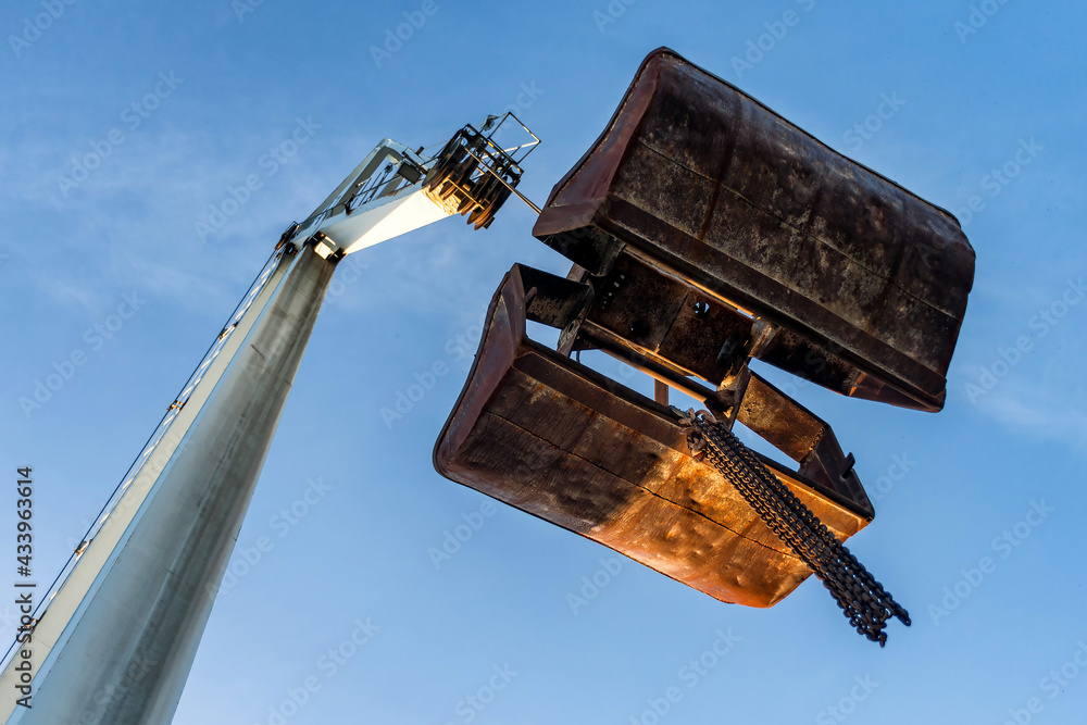 Grapple isolated on sky background. Grapple lifting device for port ...