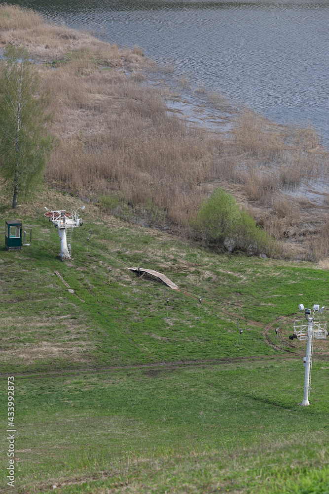 Ski lift towpath in summer.Ski rope tow without people.Lake Shore ...