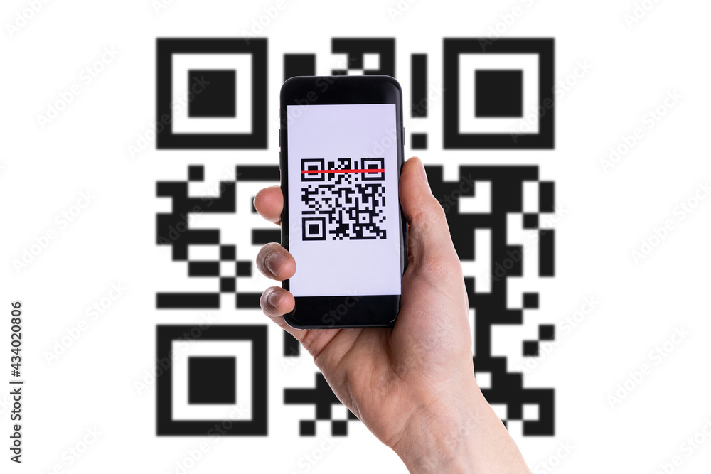 Qr code payment. Hand holding digital mobile smart phone with qr code ...
