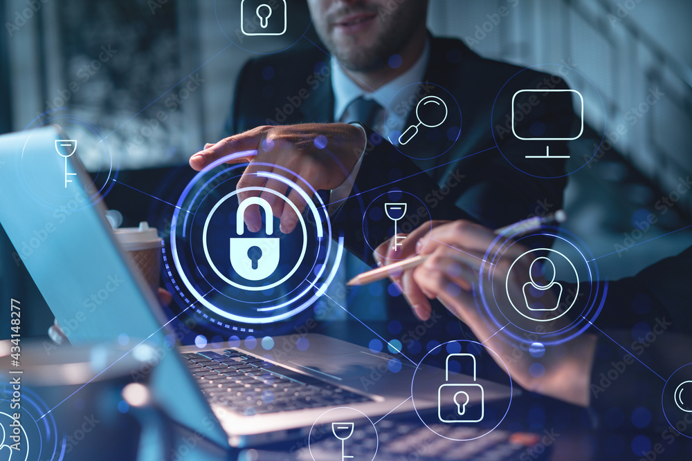 Two colleagues working together to protect clients confidential ...