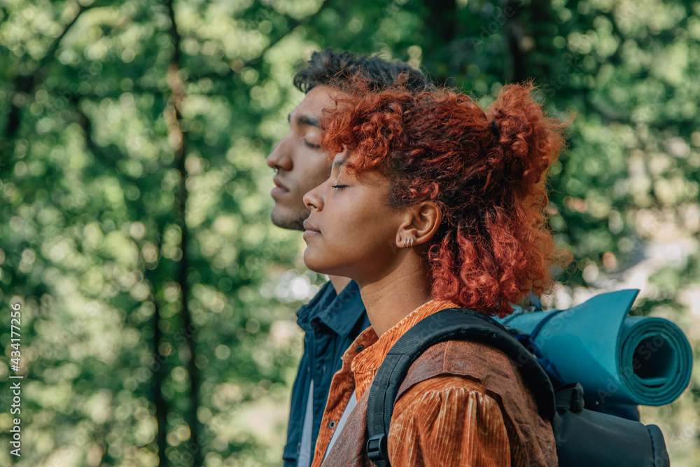 profile of relaxed couple breathing outdoors Stock Photo | Adobe Stock