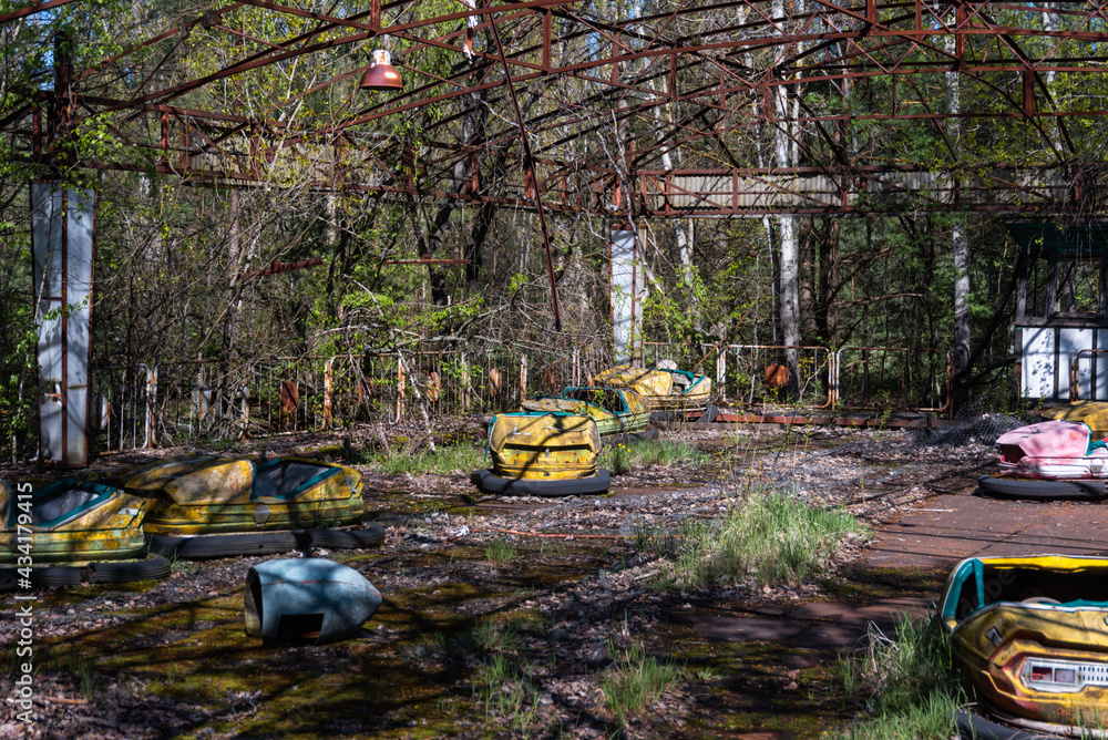 Old broken radioactive cars in amusement park. the most famous ghost ...