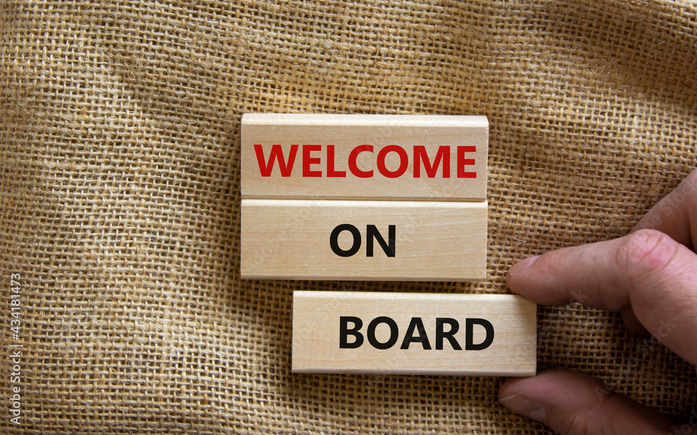 Welcome on board symbol. Wooden blocks with words 'Welcome on board ...