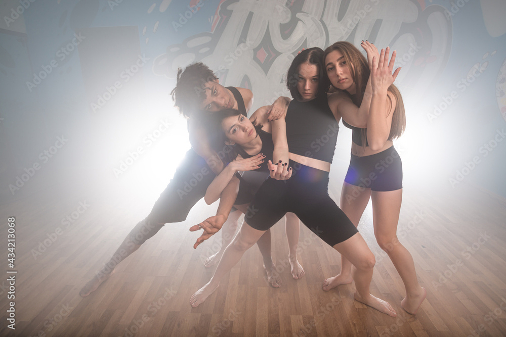 Young group of multiracial friends dancing enjoying and dancing ...