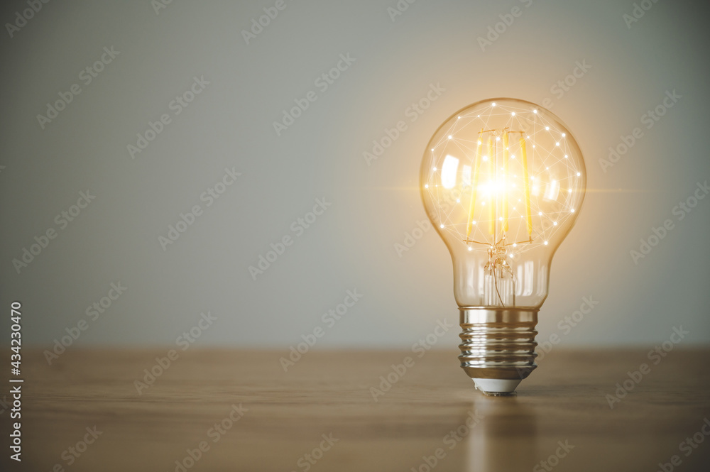 Light bulb on wood table with copy space. Concept of inspiration ...