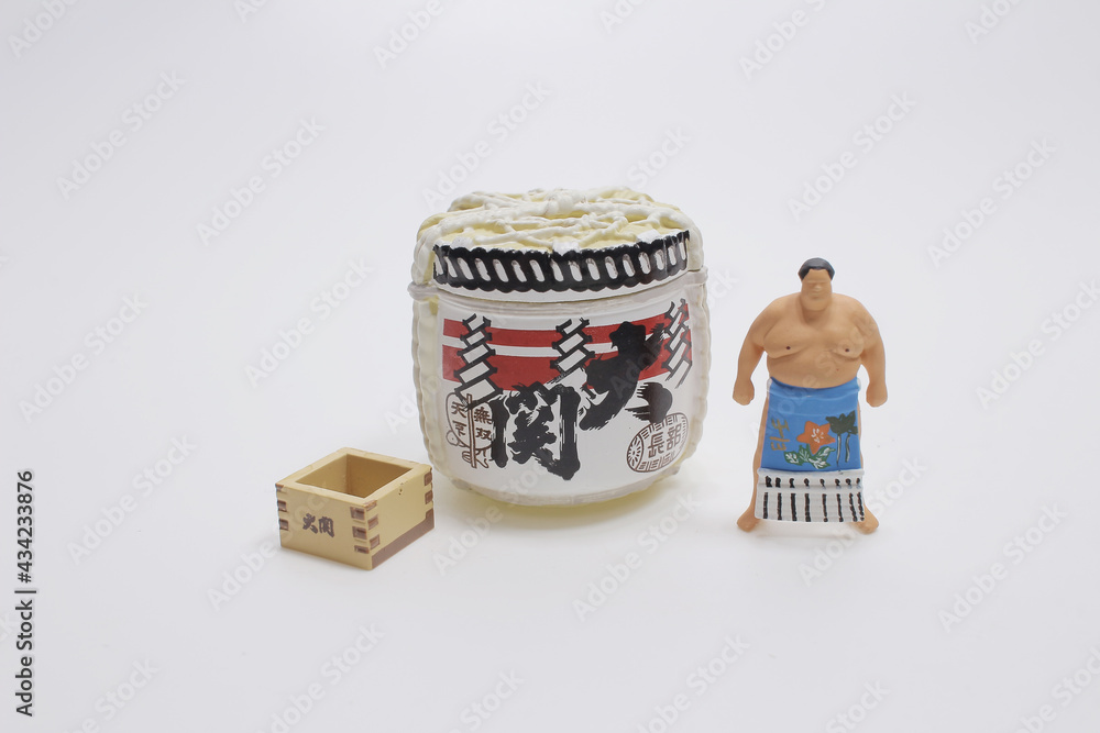 the mini sumo with the Japanese Sake Barrels Stock Photo | Adobe Stock