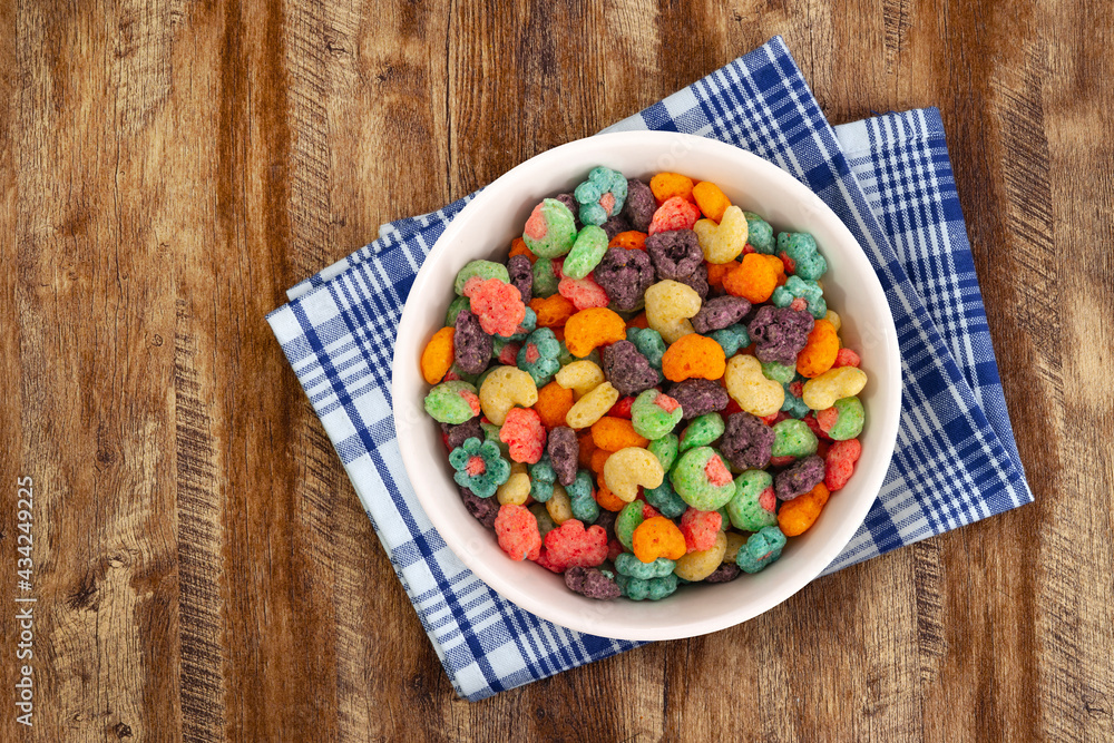 Top view of bowl with fruit cereal naturally and artificially fruit ...