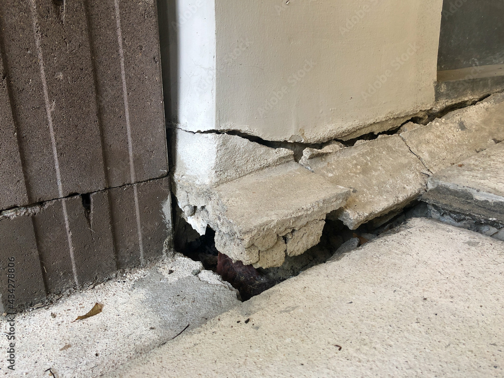 Concrete floor or cement road on old parking lot damaged and cracked ...