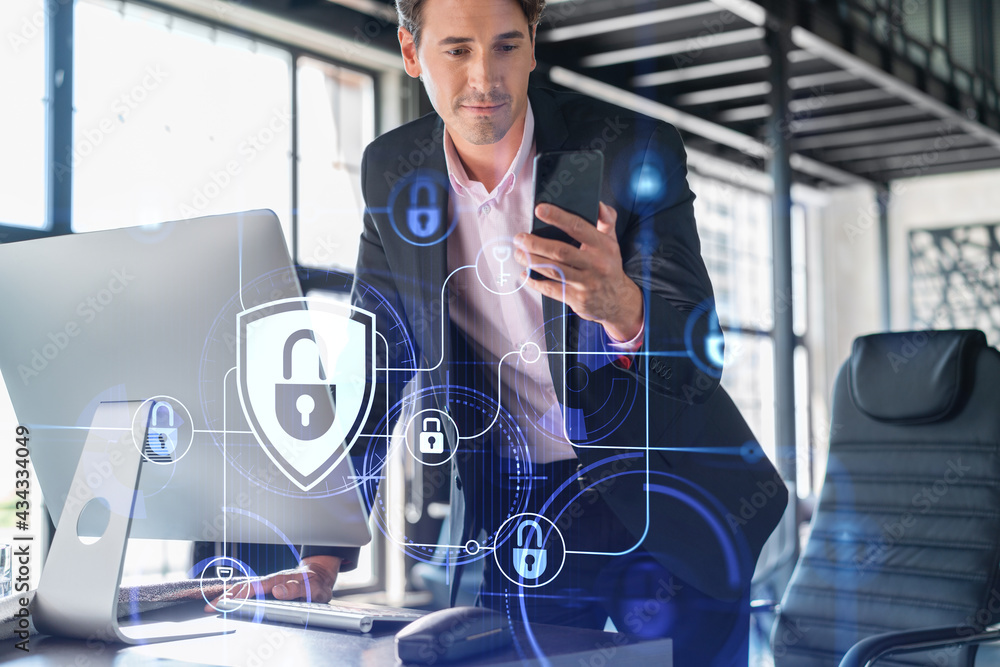 Businessman in suit checking cyber security using smart phone to protect clients confidential ...