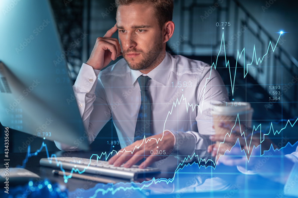 Two colleagues in formal wear working together to optimize trading ...